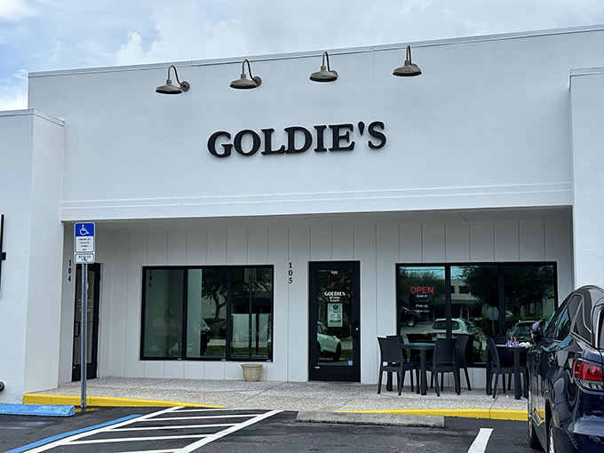 Bathed in Florida sunshine, Goldie's clean exterior gives nothing away about the comfort food paradise waiting inside. Sometimes the best places don't need flashy signs.