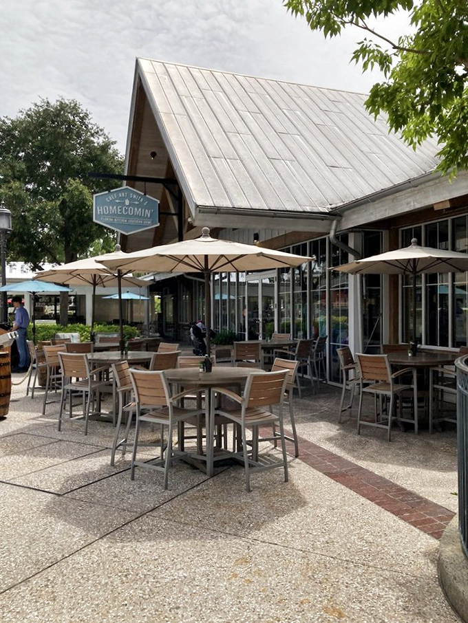 Florida farmhouse meets Disney magic in this outdoor seating area, where umbrella-shaded tables invite you to savor Southern classics while people-watching.