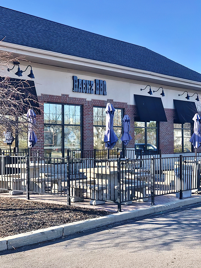 The unassuming storefront of Rackz BBQ proves once again that the best barbecue joints don't need fancy facades—just smoke signals and hungry patrons.