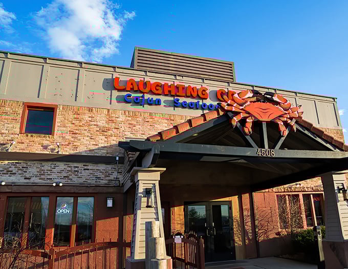 The giant red crab perched atop Laughing Crab's entrance isn't just decoration&mdash;it's a siren call to seafood lovers across Iowa's cornfields.