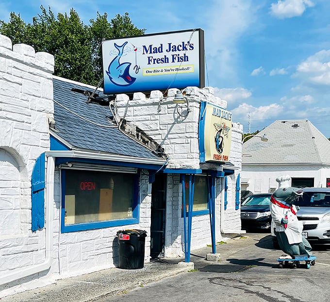 The humble white and blue exterior of Mad Jack's might not scream "seafood paradise," but locals know better. One bite and you're hooked!