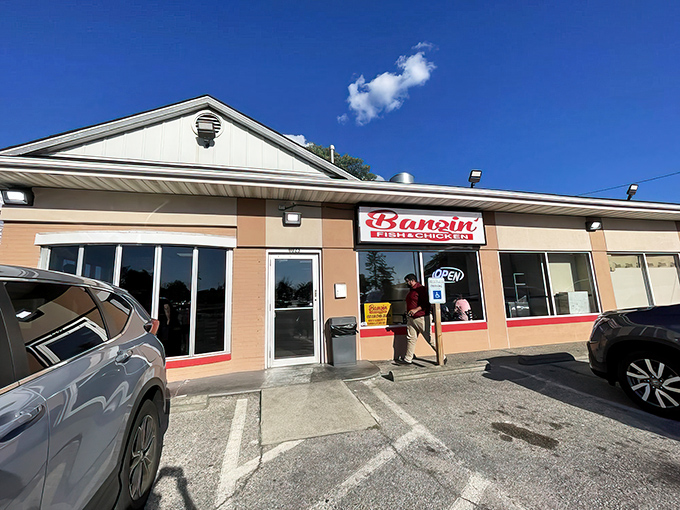The unassuming storefront might not stop traffic, but the steady stream of locals filing in and out certainly tells you something special is happening inside.