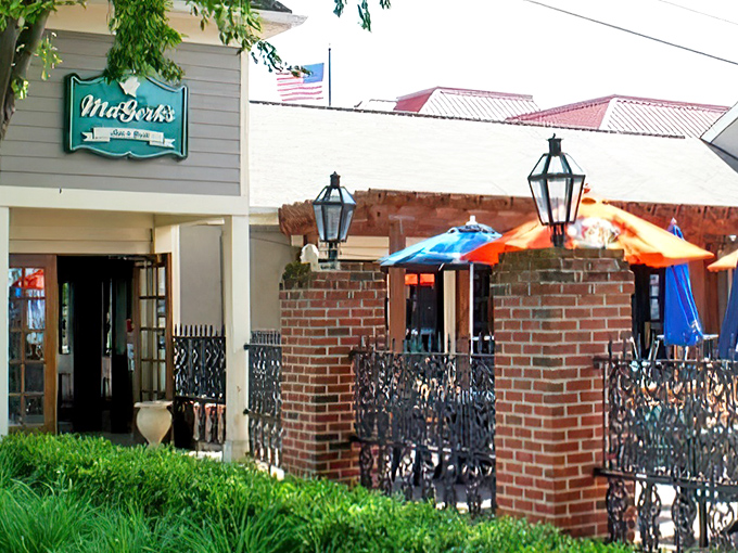 The welcoming exterior of MaGerk's beckons like an old friend, complete with charming brick patio and colorful umbrellas promising good times ahead.
