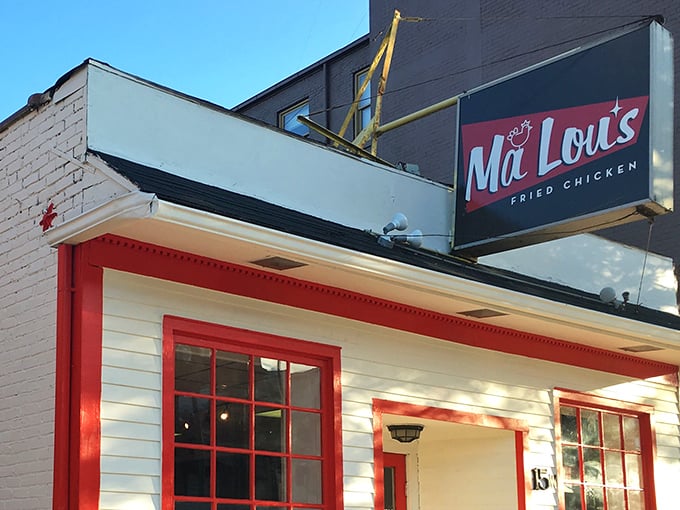 The unassuming storefront with its bright red trim is like a beacon for fried chicken pilgrims. Simplicity on the outside, culinary magic within.