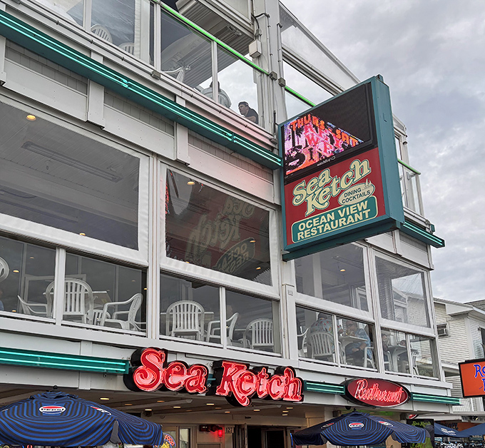 That iconic red neon sign isn't just advertising &ndash; it's a beacon of seafood salvation after a long day at Hampton Beach.
