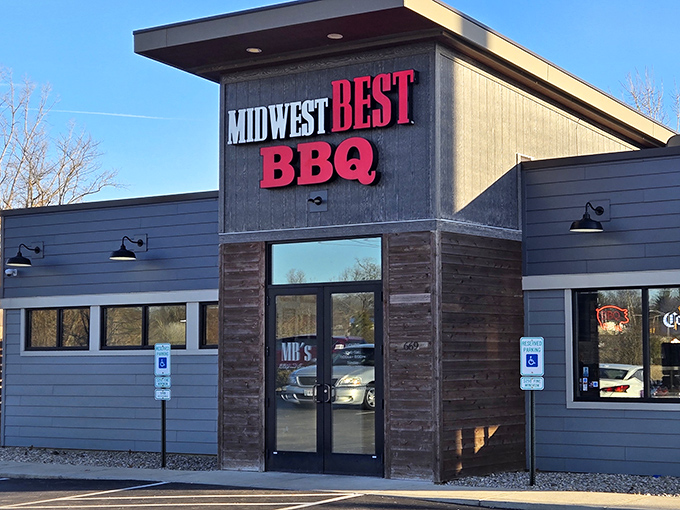 The modern yet rustic exterior of Midwest Best BBQ stands as a beacon for hungry travelers, promising smoky delights within those unassuming walls.