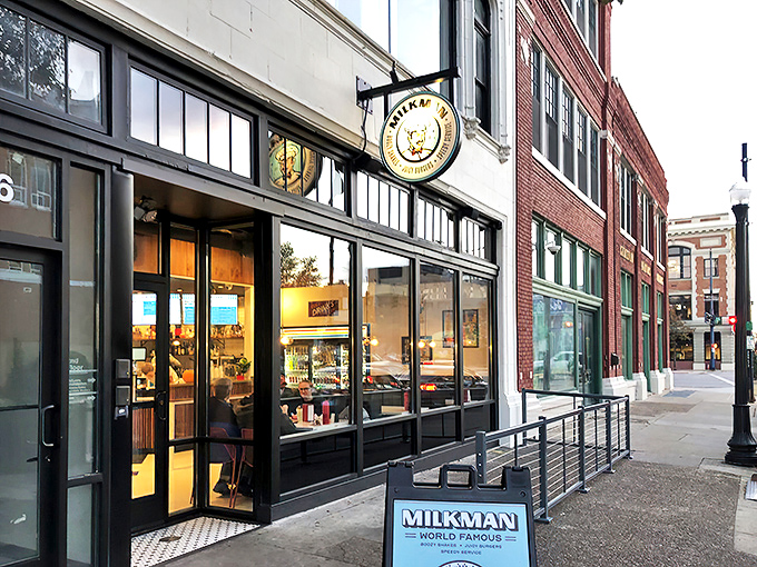 Milkman's storefront beckons from Cincinnati's historic Over-the-Rhine district, its circular logo promising burger bliss to those wise enough to step inside.