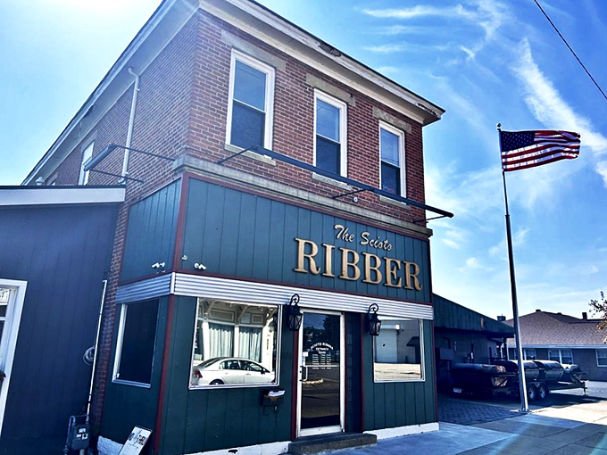 The unassuming brick exterior of Scioto Ribber stands like a culinary speakeasy in Portsmouth&mdash;no flash, just the promise of smoky perfection within.