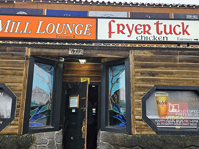 The rustic log cabin exterior of Cider Mill and Fryer Tuck Chicken stands as Portland's monument to comfort food, where two culinary worlds collide.