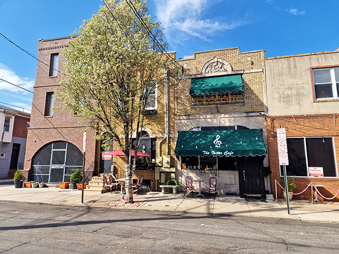 The unassuming exterior of Victor Caf&eacute; belies the operatic magic within. That green awning is Philadelphia's version of a velvet curtain.