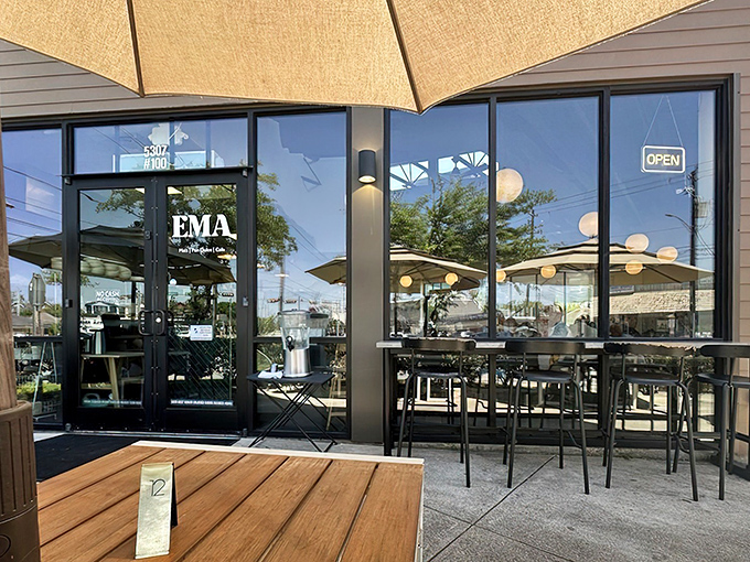 The welcoming facade of CasaEma beckons with golden globe lights and a sunny patio. Houston's best-kept secret won't stay hidden for long!