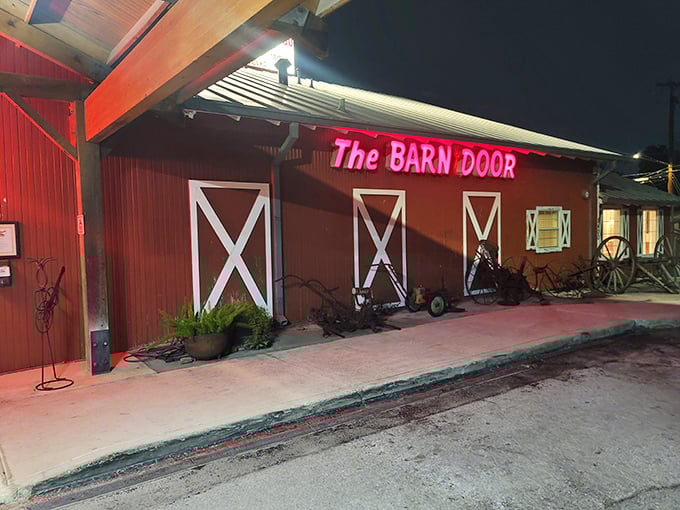 That red barn exterior isn't just for show &ndash; it's a promise of honest-to-goodness Texas steakhouse tradition waiting inside.