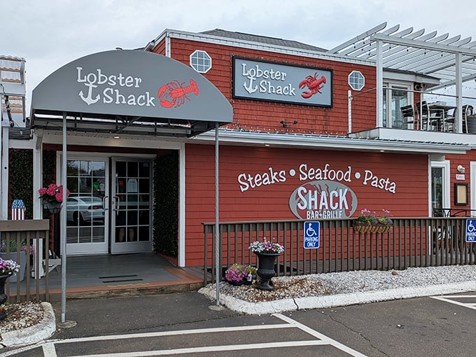 The Lobster Shack's bright red exterior isn't just eye-catching&mdash;it's a promise of seafood salvation waiting inside this East Haven treasure.