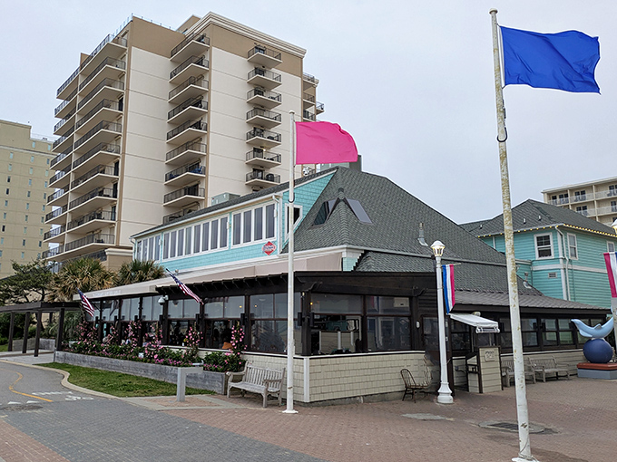 Waterman's coastal charm glows at sunset, its shingle-sided exterior and wraparound porch beckoning hungry beachgoers like a seafood siren song.