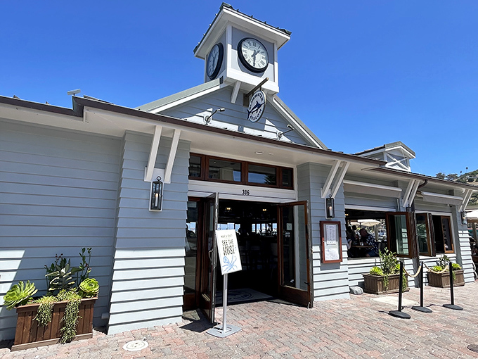 The iconic clock tower entrance stands like a maritime timekeeper, reminding visitors it's always the right hour for fresh seafood.