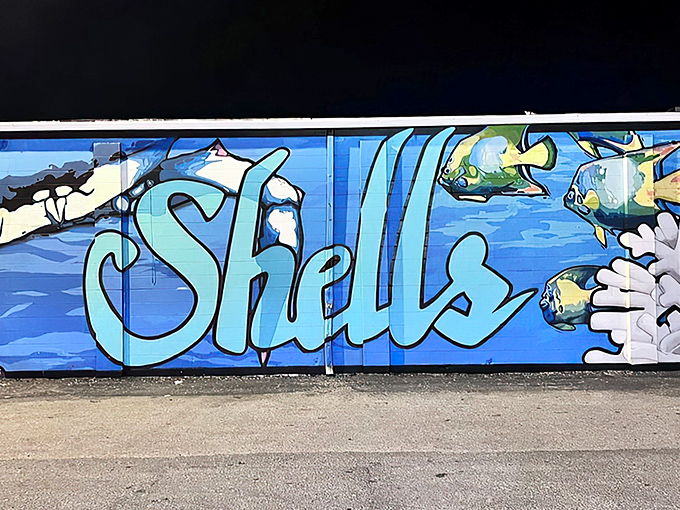 Like an underwater street artist's masterpiece, this vibrant blue mural sets the tone before you've even tasted a single shrimp.