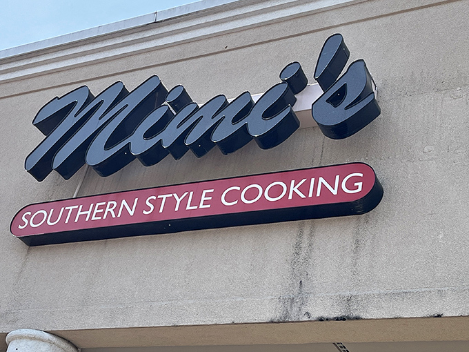 That classic blue script against beige brick announces what locals already know&mdash;this isn't just a sign, it's a beacon of Southern comfort for Lexington's comfort food pilgrims.