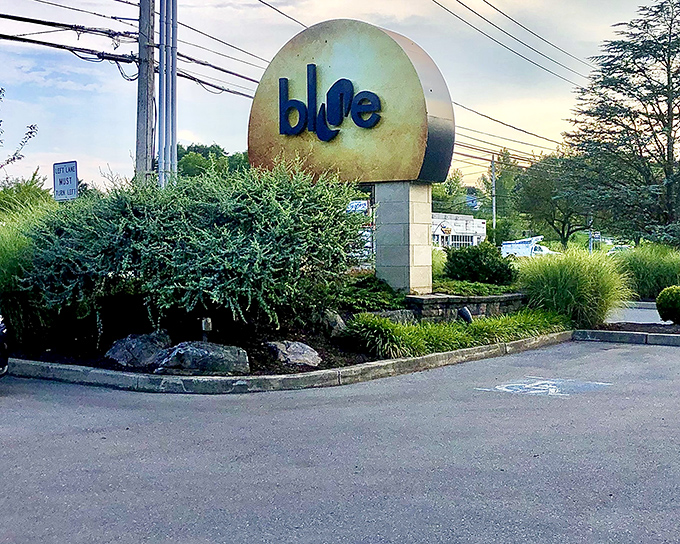 The iconic golden "blue" sign welcomes hungry travelers like a beacon of culinary hope in Bethlehem's dining landscape.