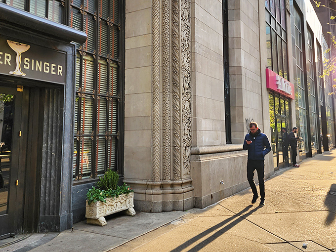 The elegant exterior of Butcher and Singer beckons like a time portal to old Hollywood. That cocktail glass logo isn't just signage&mdash;it's a promise of sophistication awaiting inside.