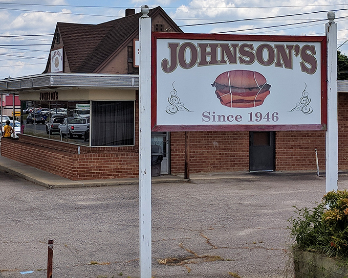 The unassuming brick exterior of Johnson's Drive-In hides a burger paradise that's been drawing crowds since 1946. Some treasures don't need fancy packaging.