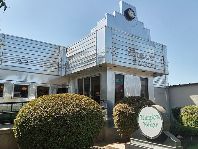 The gleaming Art Deco fa&ccedil;ade of Dimples Diner stands like a silver beacon of breakfast hope in Visalia, promising comfort food salvation to hungry travelers.