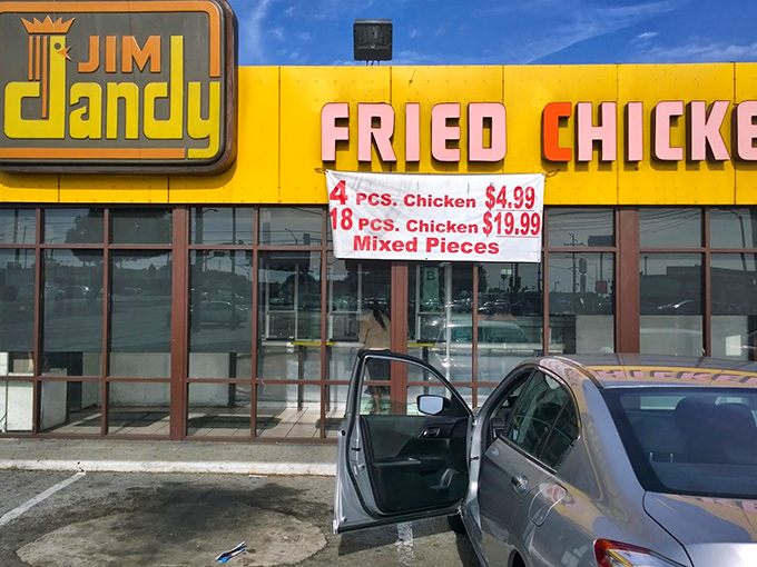 That yellow sign isn't whispering&mdash;it's announcing crispy chicken excellence with the confidence of a seasoned soul food champion.