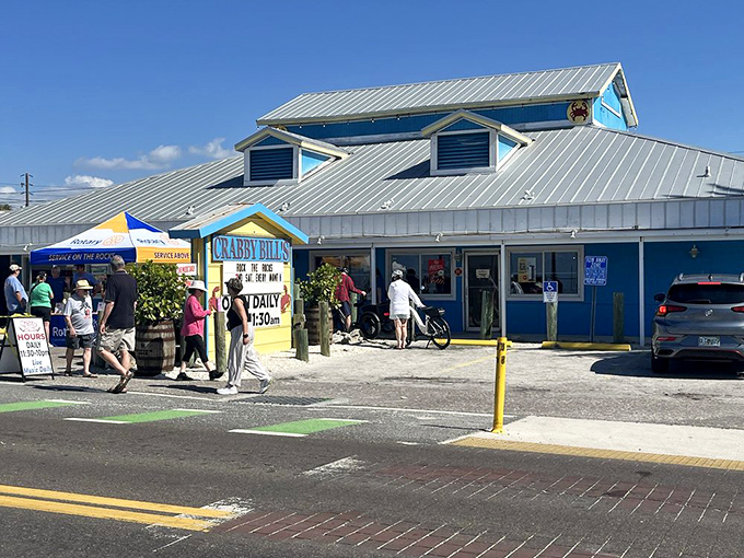 The bright blue exterior of Crabby Bill's stands like a beacon for seafood lovers, promising Florida flavors without the fuss.