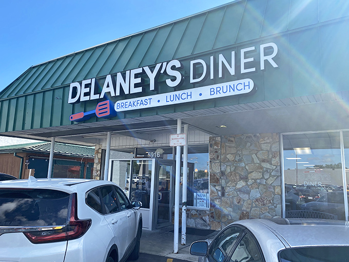The green-roofed simplicity of Delaney's Diner promises what fancy establishments often forget&mdash;honest food that speaks for itself without needing a translator.