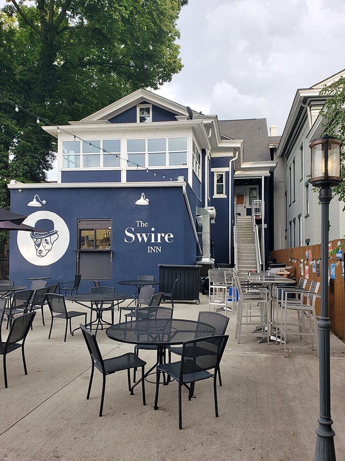 A closer look at The Swire Inn's distinctive blue exterior, where that dapper gentleman logo promises British charm in Middletown.