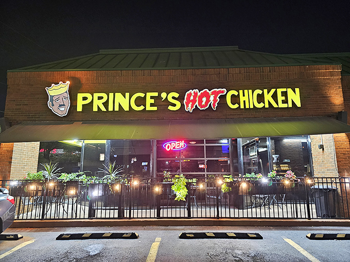 By night, Prince's neon sign beckons hungry pilgrims with the promise of Nashville's most famous culinary revenge story turned delicious tradition.