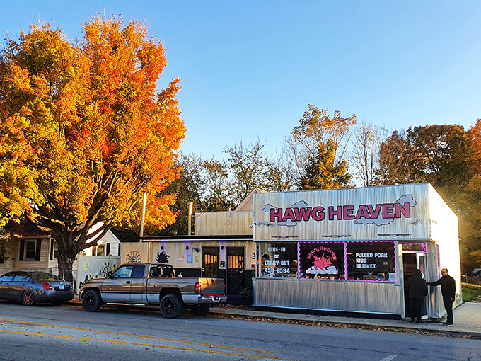 Fall's fiery display creates the perfect backdrop for Hawg Heaven's unassuming exterior. Mother Nature's showing off, but the real masterpiece awaits inside.
