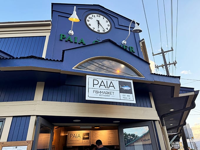 The iconic blue facade of Paia Fish Market stands as a beacon for seafood lovers&mdash;it's always time for fresh fish in paradise.