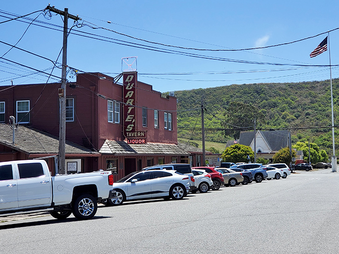 The iconic brick-red exterior of Duarte's Tavern stands like a culinary lighthouse on Pescadero's main drag, beckoning hungry travelers with its vintage charm.