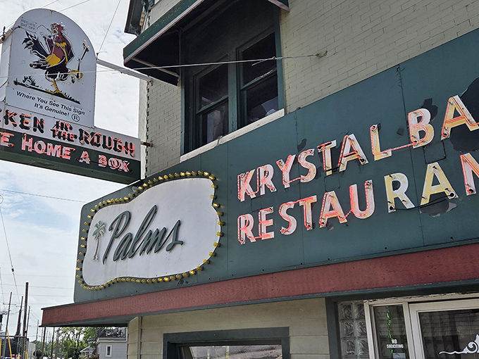 The mint-green exterior with its vintage signage and palm tree motif feels like a time capsule from a simpler era of dining. Pure Michigan nostalgia.