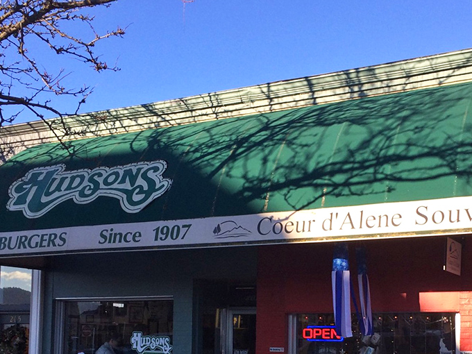 The iconic green awning beckons like a lighthouse for the burger-starved, promising simple perfection in a world of overcomplicated food trends.