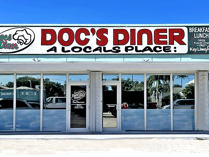 The unassuming storefront of Doc's Diner proudly declares itself "A Local's Place" – the Keys equivalent of finding the secret password to culinary paradise.