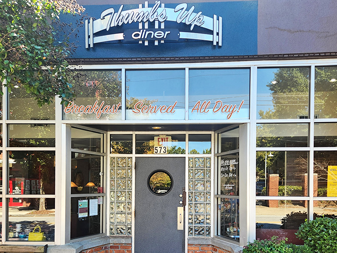 The iconic blue facade of Thumbs Up Diner promises "Breakfast Served All Day!" &ndash; words that should be carved into the Mount Rushmore of culinary comforts.