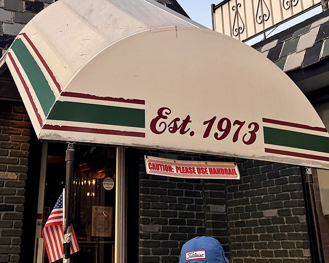 That iconic green and burgundy awning isn't just decoration&mdash;it's a portal to a time when diners were the cornerstone of American social life.