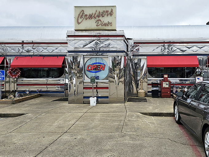The gleaming chrome exterior of Cruisers Diner shines like a beacon of hope for hungry travelers, promising classic American comfort in stainless steel splendor.