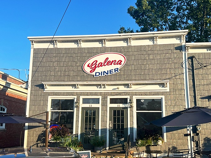 That iconic red and white sign beckons like a lighthouse for the breakfast-starved. The stone exterior might be humble, but culinary treasures await inside.
