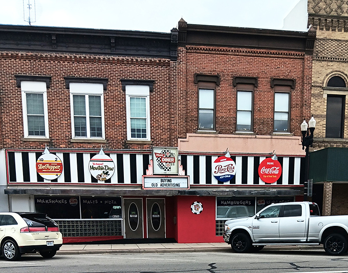 The classic brick facade of Mom's Diner beckons like a time machine disguised as a restaurant. Those vintage soda signs aren't just decoration&mdash;they're a promise of nostalgia served fresh daily.