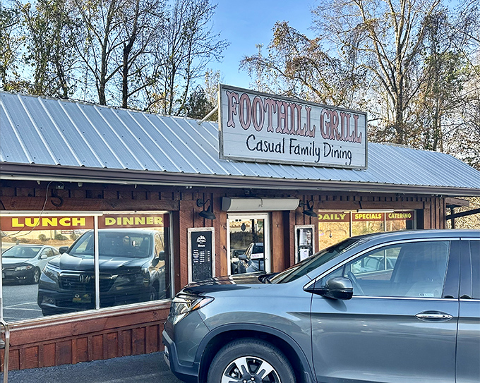 The unassuming wooden exterior of Foothill Grill might fool you, but locals know this modest facade hides culinary treasures that keep them coming back daily.