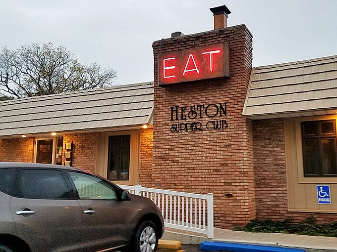 That same commanding "EAT" sign at dusk, when the red neon transforms from suggestion to imperative. Resistance is futile&mdash;and why would you want to resist?