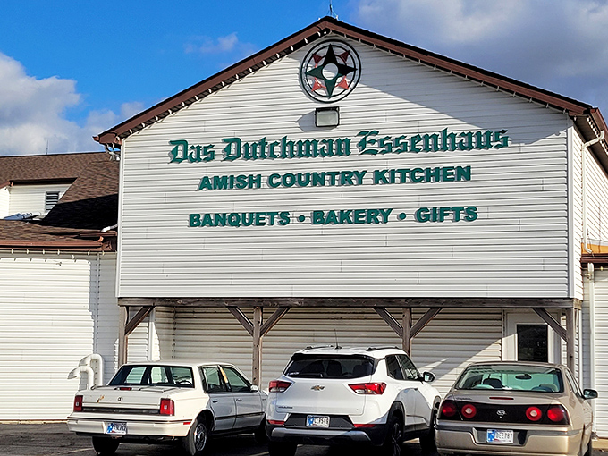 The iconic white facade of Das Dutchman Essenhaus stands as a beacon of comfort food in Middlebury, promising culinary traditions that have drawn hungry pilgrims for generations.