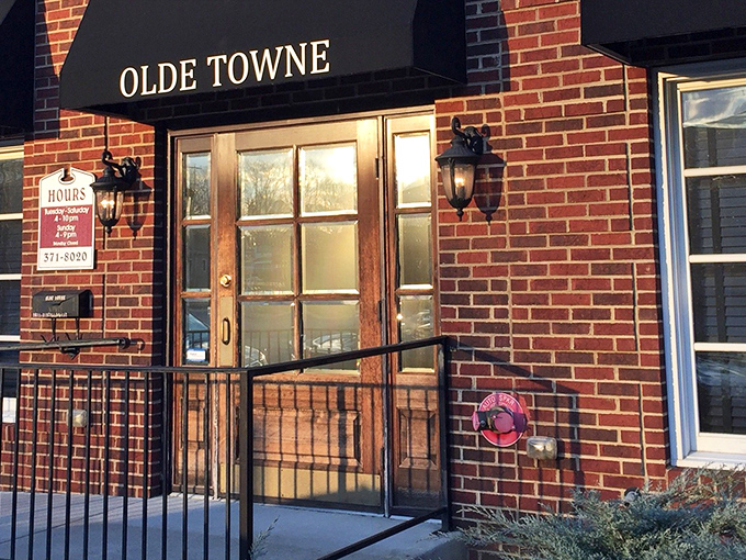 The unassuming brick exterior with its classic black awning is like that friend who doesn't brag but always delivers. Culinary treasures await behind that glass-paned door.