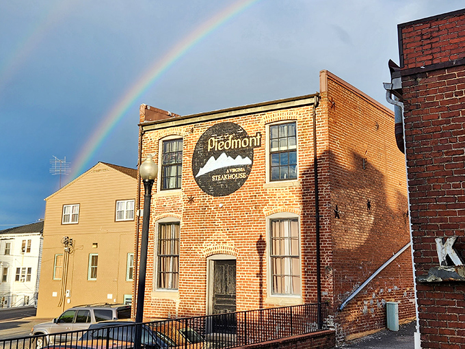 A rainbow arches over Piedmont Steakhouse like nature's own seal of approval. Even the sky can't resist this Culpeper gem.