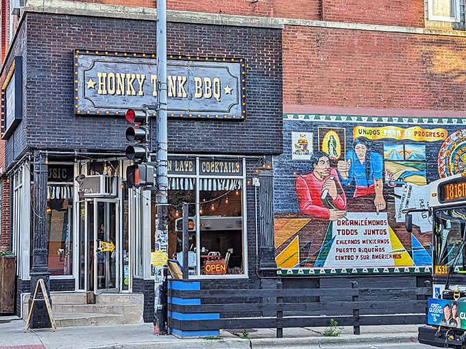 Step inside and you'll find colorful murals celebrating the neighborhood's vibrant culture right next to that welcoming entrance.