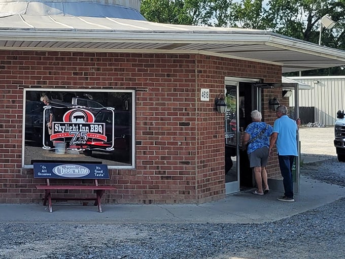 The unassuming brick exterior with that iconic silver dome says it all: barbecue greatness doesn't need fancy packaging, just wood smoke and tradition.