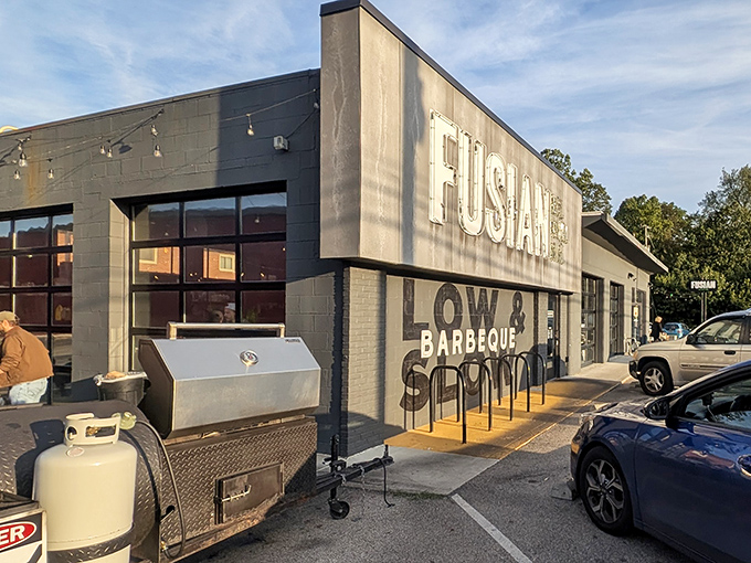 Where rustic meets industrial: Ray Ray's exterior proudly announces its barbecue identity with a smoker ready for action.