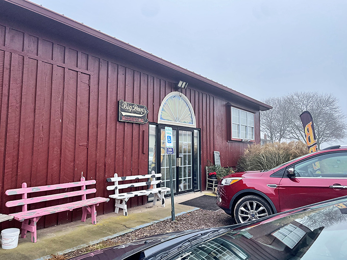 The red exterior of Big Dan's might not scream "barbecue royalty," but that pink bench outside? That's where the post-meal food coma happens. Worth every minute.